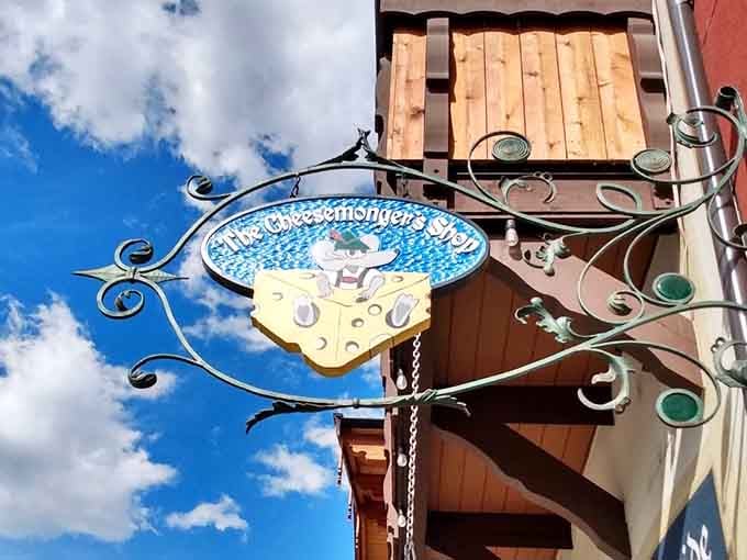 That whimsical hanging sign with the cheerful cheese character basically says "abandon your diet, all who enter here."