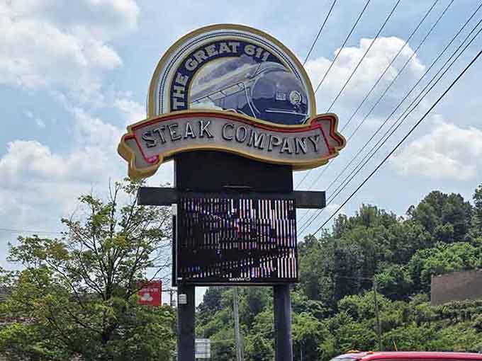 The iconic sign featuring a streamlined locomotive promises an experience where great steaks meet even greater railroad history perfectly.