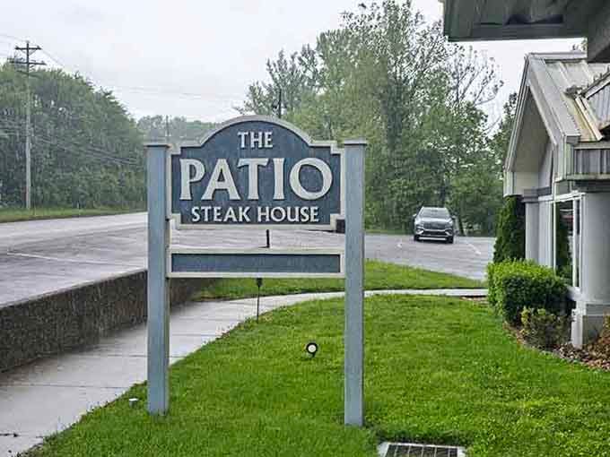 The roadside sign stands proud, marking the spot where countless memorable meals and satisfied appetites have begun their journey.