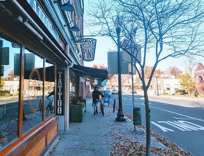 The corner location catches autumn light beautifully, making this brewpub look like a New England postcard come alive.