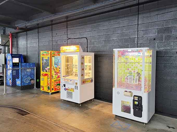 Claw machines stand ready to test your skill and patience, offering prizes to those blessed with coordination and luck.