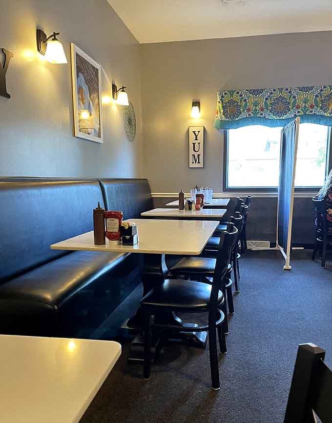Comfortable seating and warm lighting create the perfect atmosphere for lingering over that second cup of coffee.
