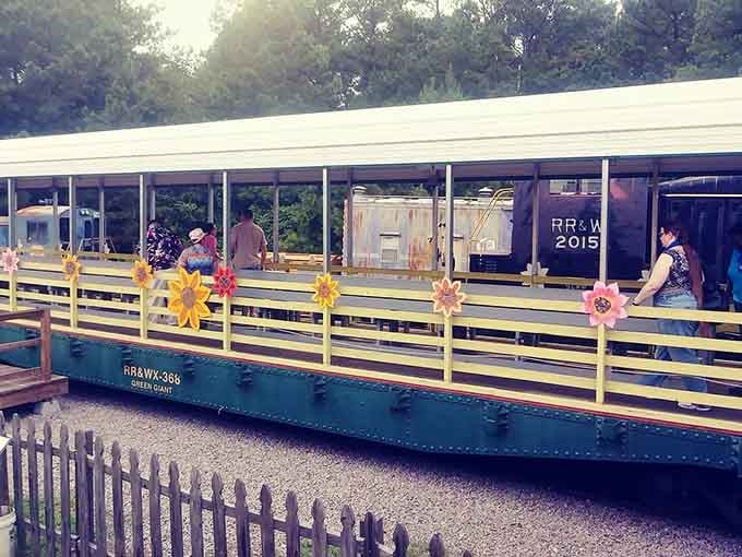 The open-air excursion car decorated with cheerful flowers offers breezy views and pure nostalgic joy on wheels.