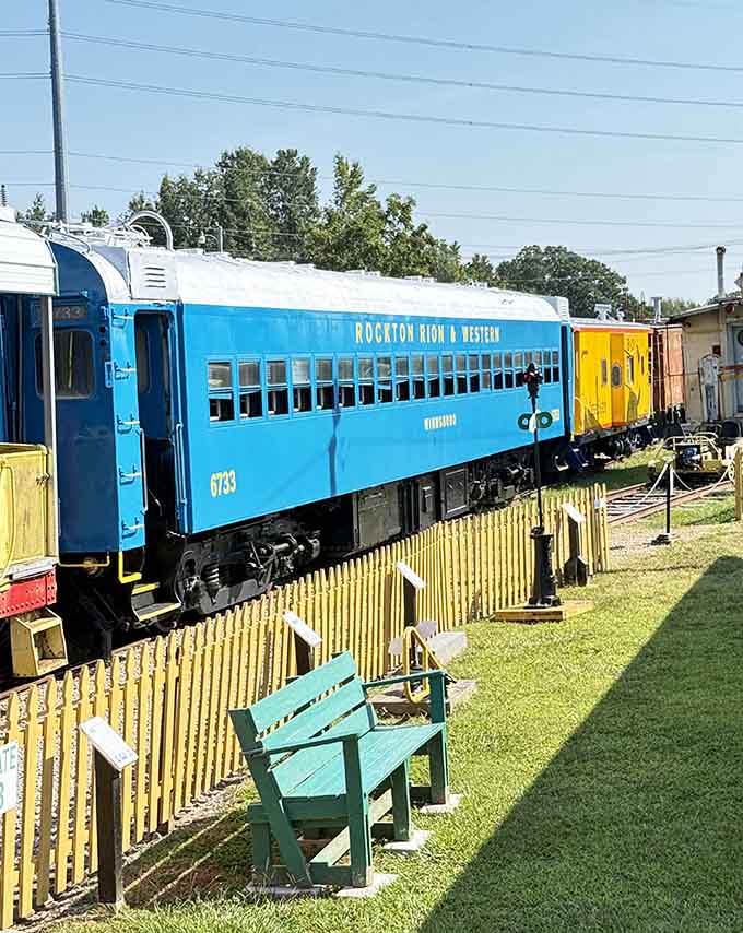 The bright blue Rockton Rion passenger car with a bench inviting you to sit and stay awhile.
