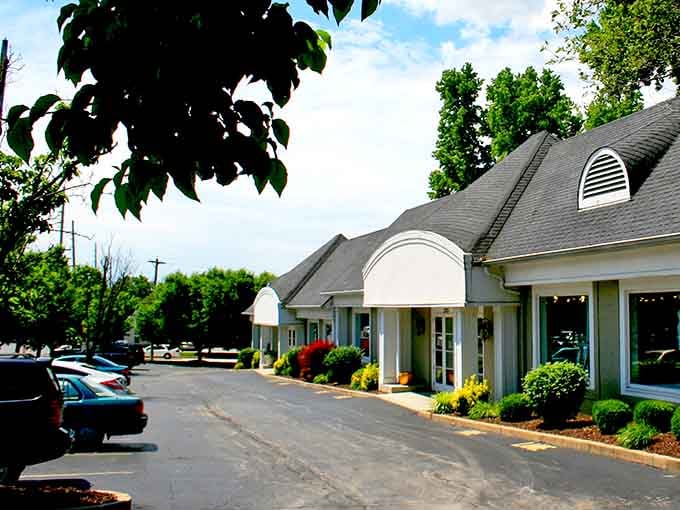 Lush greenery frames the charming exterior where savvy shoppers discover that looking like a million bucks doesn't require actually spending it.