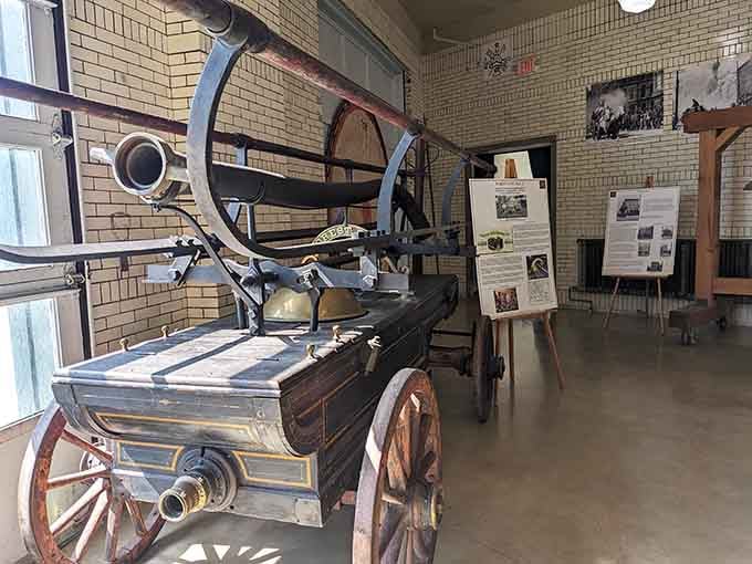 The Thayer Hand Pumper Fire Wagon required serious muscle power to operate, making today's firefighters grateful for modern hydraulic systems.