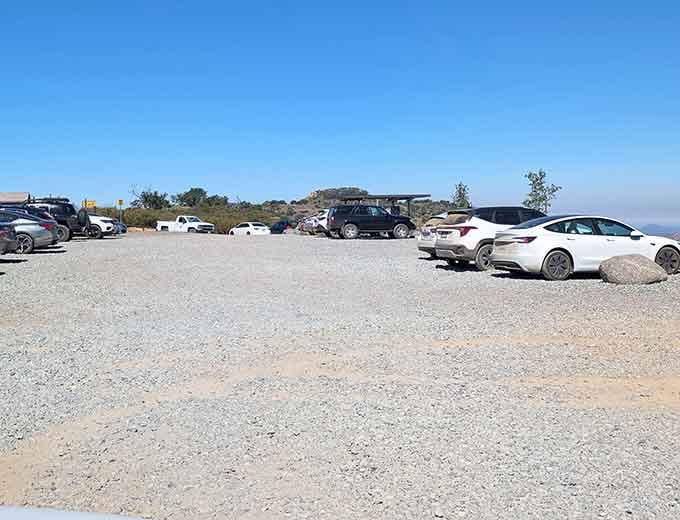 Packed parking lot proving this secret isn't so secret anymore, but those waterfalls are absolutely worth sharing space.
