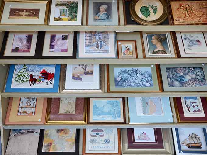 Framed art covering the wall like a gallery opening where everything's actually, miraculously, affordable for once.