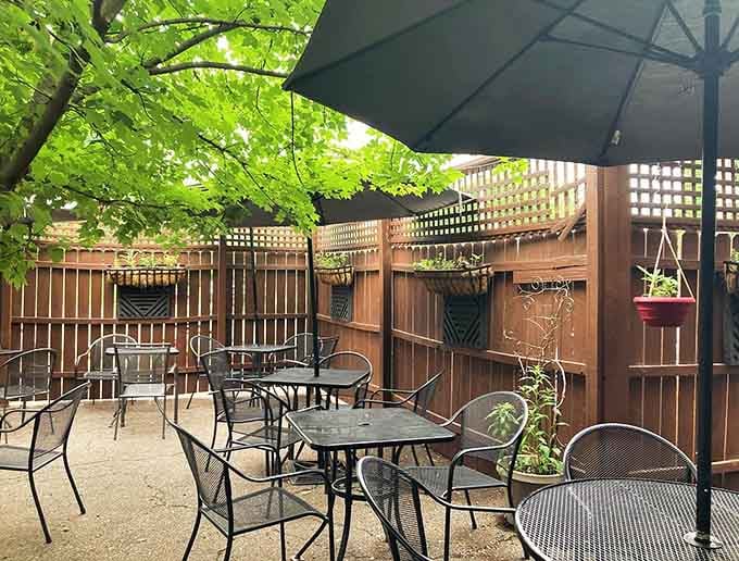 An outdoor patio where you can enjoy Wisconsin summers while contemplating your next burger order under the trees.