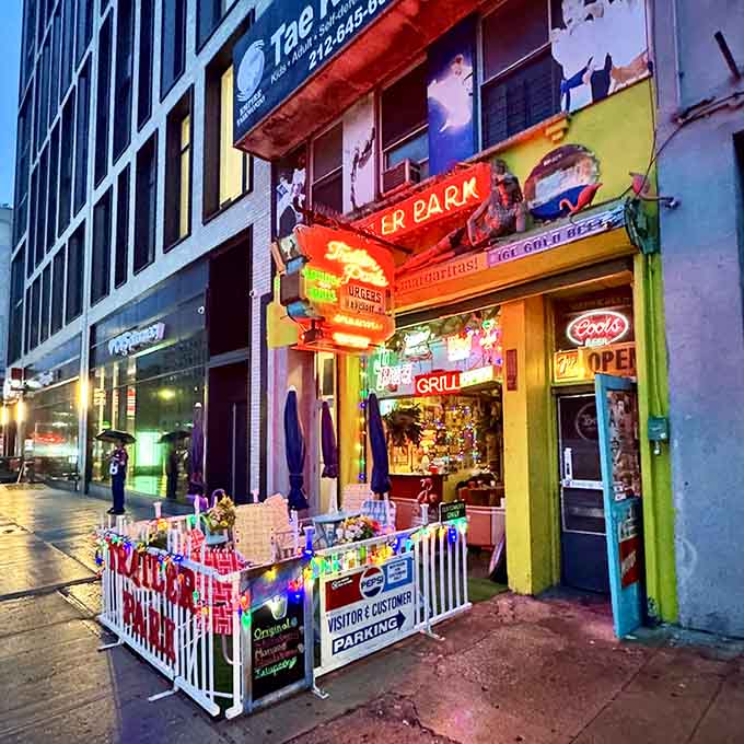 At night, the neon glow beckons like a beacon for anyone seeking unpretentious food and good times.