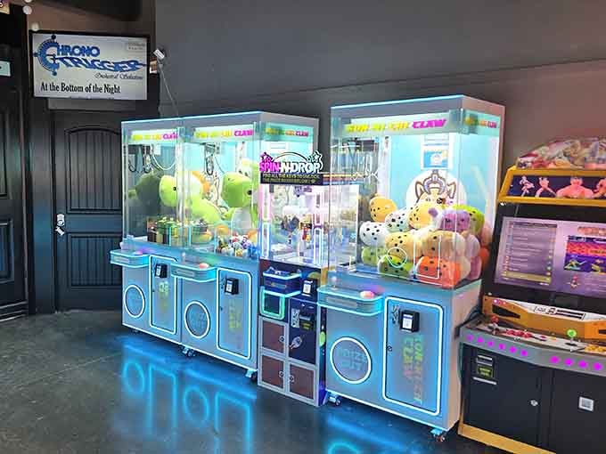 Claw machines tempting kids and adults alike, because sometimes you need a break from serious shopping.