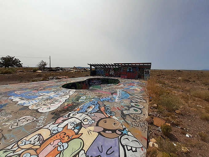 Even the old pool area has become an outdoor art installation, colorful and surprisingly cheerful.
