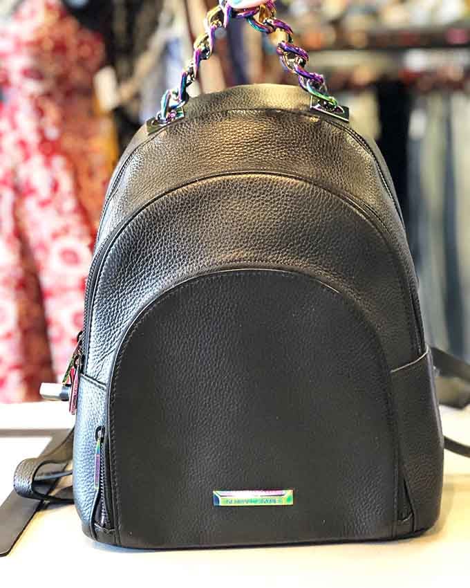 A leather backpack that looks ready to accompany you on adventures, or at least to the grocery store in style.