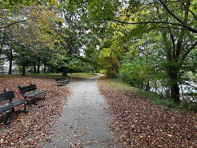Fall leaves carpeting the riverside path create the perfect excuse for a contemplative afternoon stroll.