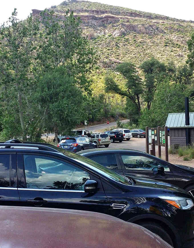 A full parking lot signals you've found something special, though early birds still catch the best waterfall views.