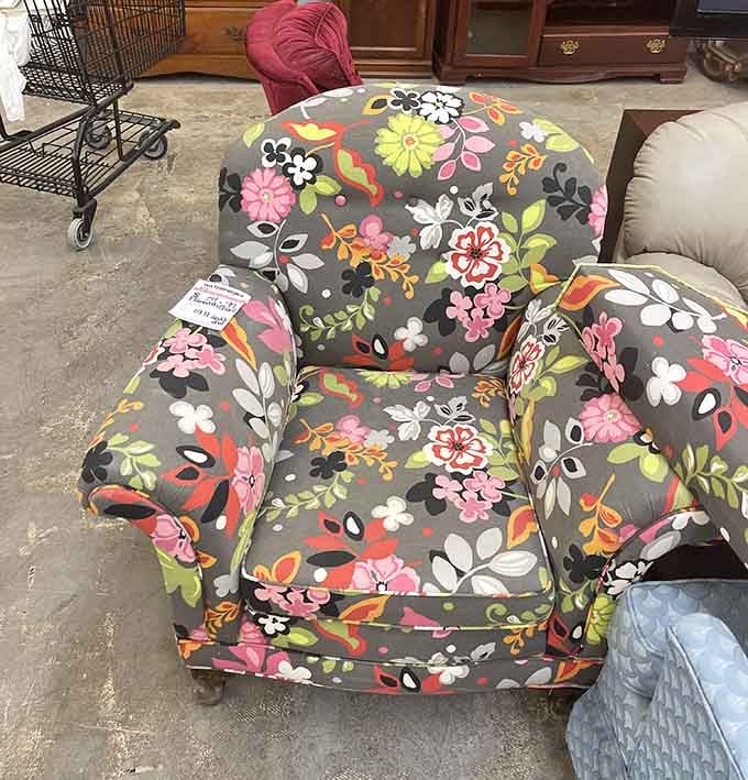 That floral armchair has more personality than most new furniture, and probably better stories to tell too.