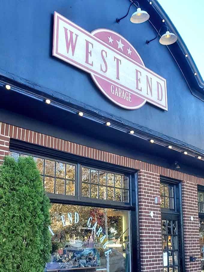 The blue exterior with string lights creates an inviting evening atmosphere that draws shoppers in like moths to flame.