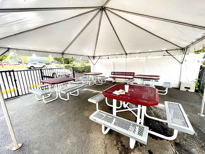 Outdoor dining under the tent extends the White Hut experience beyond four walls into fresh air.