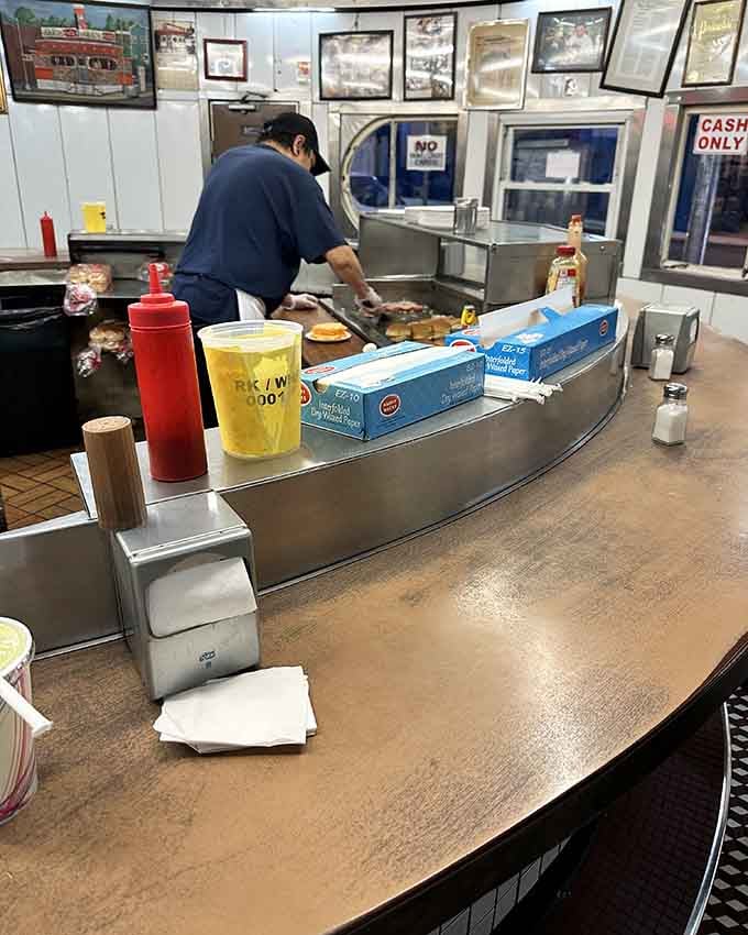 Watching skilled hands work that griddle is better than most cooking shows, and you get to eat afterward.