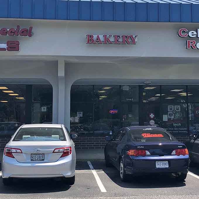 Sometimes the best treasures hide behind simple "BAKERY" signs in shopping centers you've driven past a hundred times.