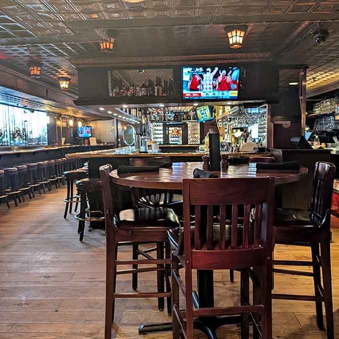 The spacious bar area features decorative tin ceilings and plenty of seating for those who prefer their meals social.