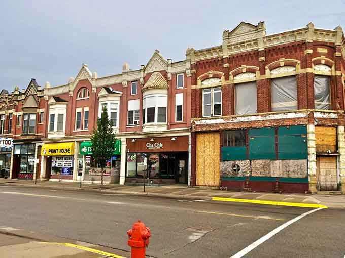 These storefronts showcase the kind of ornate details that modern construction forgot how to build.