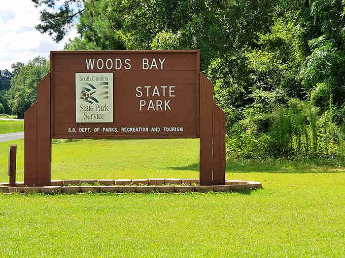 The entrance sign stands proud and simple, marking the gateway to one of South Carolina's best-kept natural treasures.