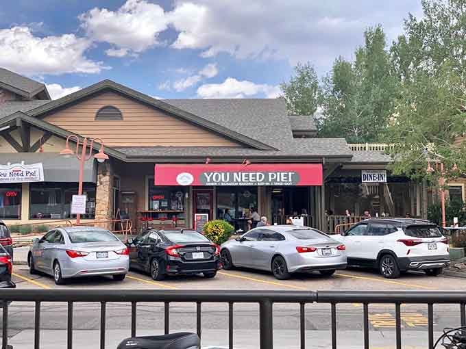 Those parked cars tell the story: people drive here deliberately, park intentionally, and leave extremely satisfied with life.