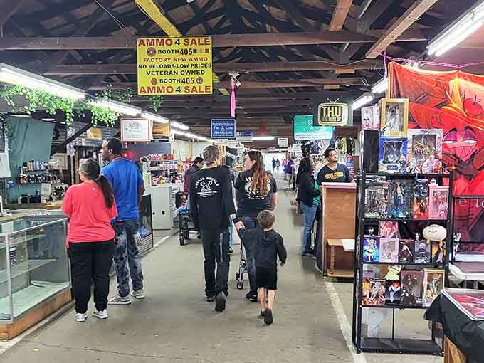 Families stroll through endless aisles where collectibles and treasures wait under rustic wooden beams overhead.