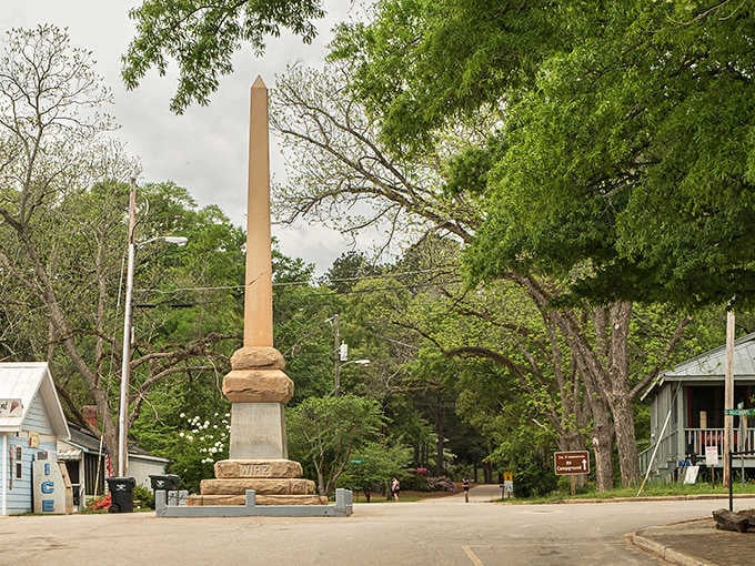 This monument stands silent in the town center, a solemn reminder of history that still echoes today.