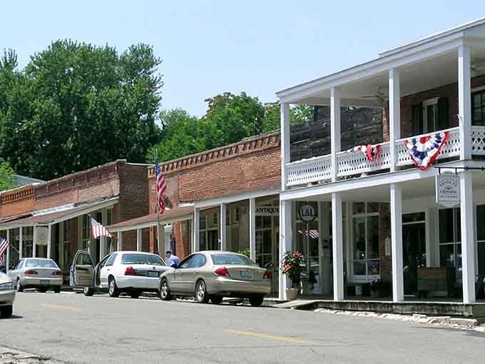 Those patriotic bunting-draped porches and brick storefronts whisper stories from when America was still finding its footing.