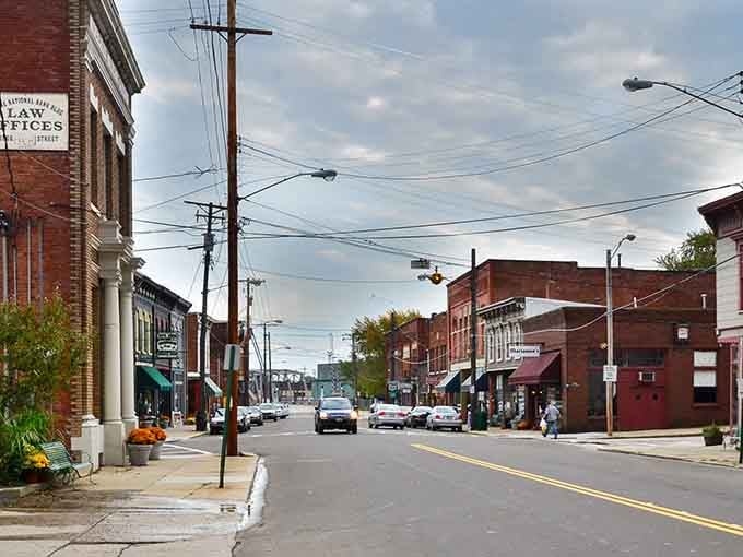 Classic brick storefronts line this lakeside street where history meets everyday life in the most charming way.