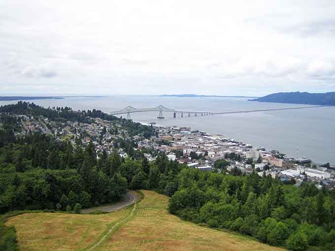 Where the mighty Columbia River kisses the Pacific Ocean, this hillside view reveals a coastal gem worth discovering.