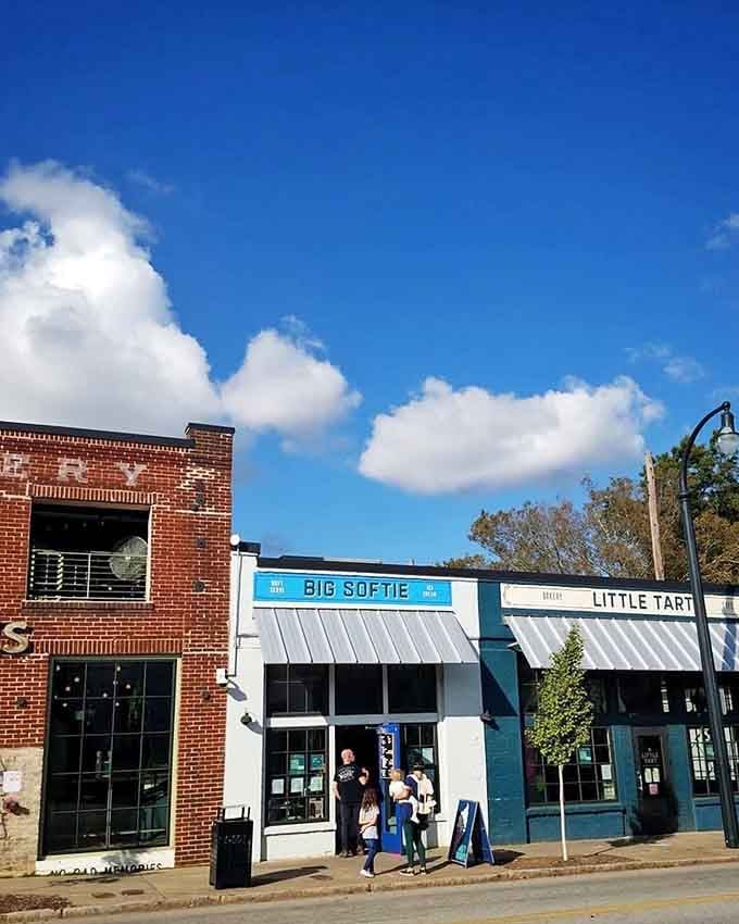 That blue and white storefront practically sings "come get your happiness here" on a perfect sunny day.