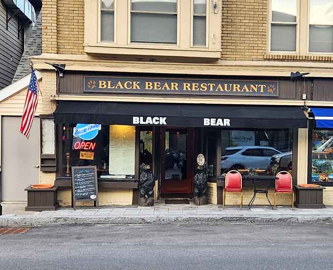 That classic storefront with the glowing "OPEN" sign is calling your name like a dinner bell in the mountains.