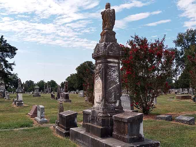 That towering monument stands guard like a Victorian sentinel, weathered by time but still commanding respect and attention.