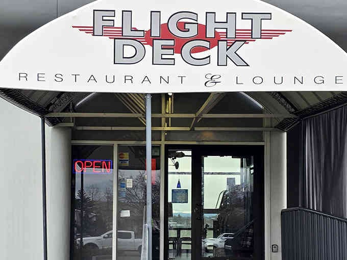 That retro aviation signage promises runway views with your meal, making every bite feel like first class.