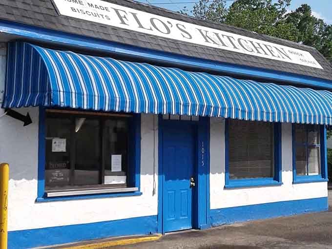 That cheerful blue and white striped awning promises homemade biscuits and Southern comfort inside this tiny treasure.