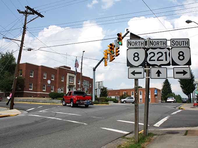 Where three highways meet, a charming mountain crossroads waits with brick buildings and small-town magic.