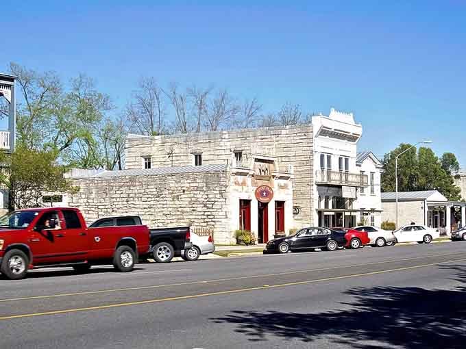 Those limestone buildings whisper German heritage while modern trucks cruise by, creating a delightful time-travel paradox.