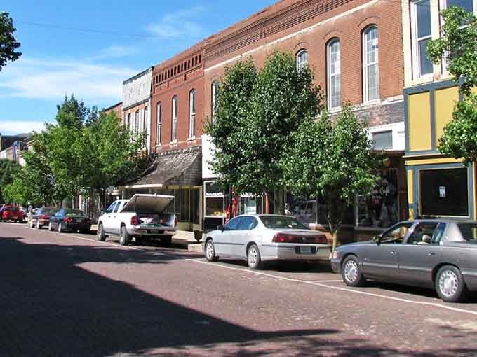 Tree-lined streets and brick storefronts create the perfect Main Street America scene you thought only existed in movies.