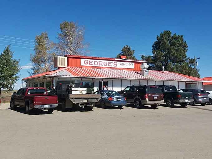 That red-striped roof and packed parking lot tell you everything: this roadside classic serves food worth stopping for.