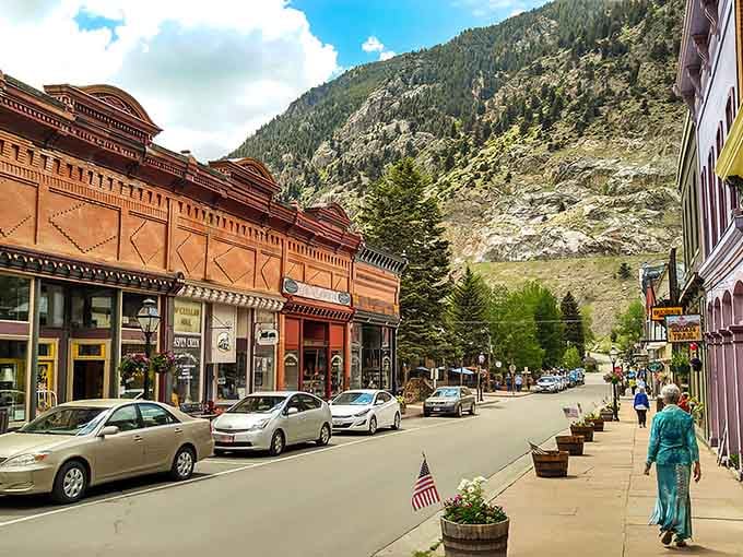 Victorian storefronts frame mountain peaks like a postcard that somehow came to life and invited you in.