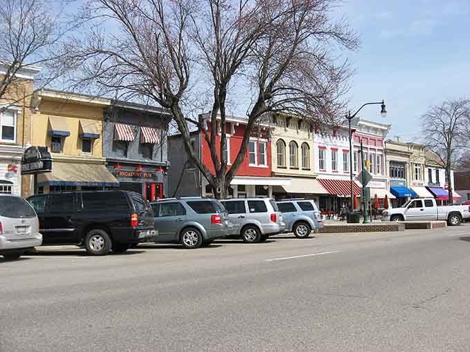 Colorful storefronts line this charming main street where parking spots fill up faster than a Sunday brunch reservation.