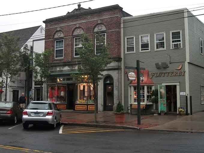 Brick and clapboard buildings stand shoulder to shoulder, their architectural charm spanning generations of New England history.