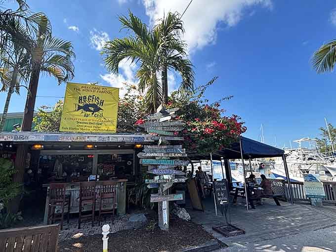 Palm trees swaying, boats bobbing, and that thatched roof promising fresh seafood&mdash;this is paradise with a menu.