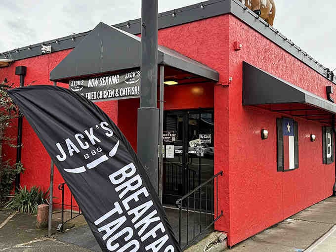 That bold red exterior isn't shy about announcing what's inside: serious BBQ that'll make your day infinitely better.