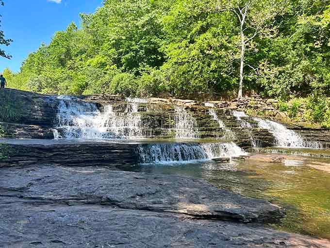 These layered waterfalls cascade over limestone like nature's own wedding cake, minus the frosting but twice as refreshing.