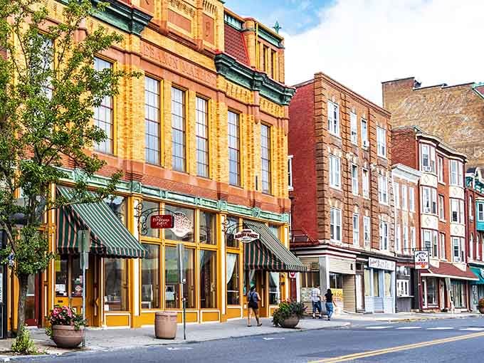 That golden storefront practically glows with small-town charm, like Main Street USA before the mall arrived.