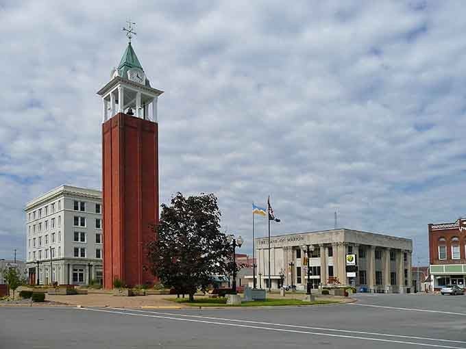 That striking red tower stands proud against the sky, a beacon welcoming you to small-town charm and affordability.
